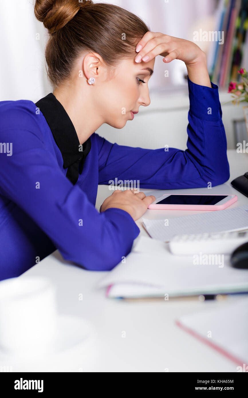tired woman manager in the office Stock Photo - Alamy