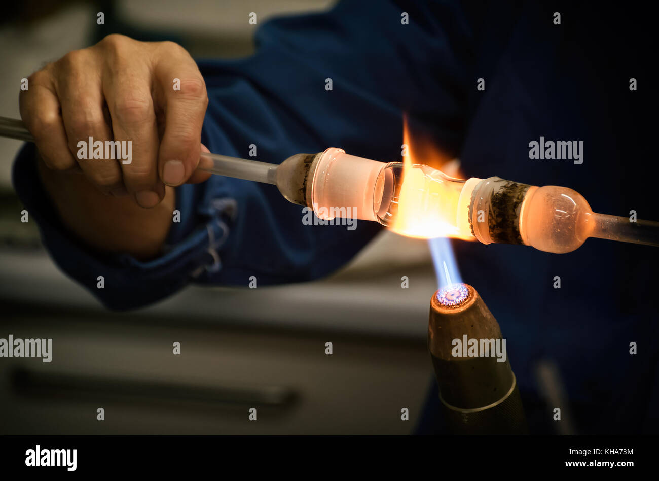 Glass melting during production of chemistry glassware Stock Photo - Alamy