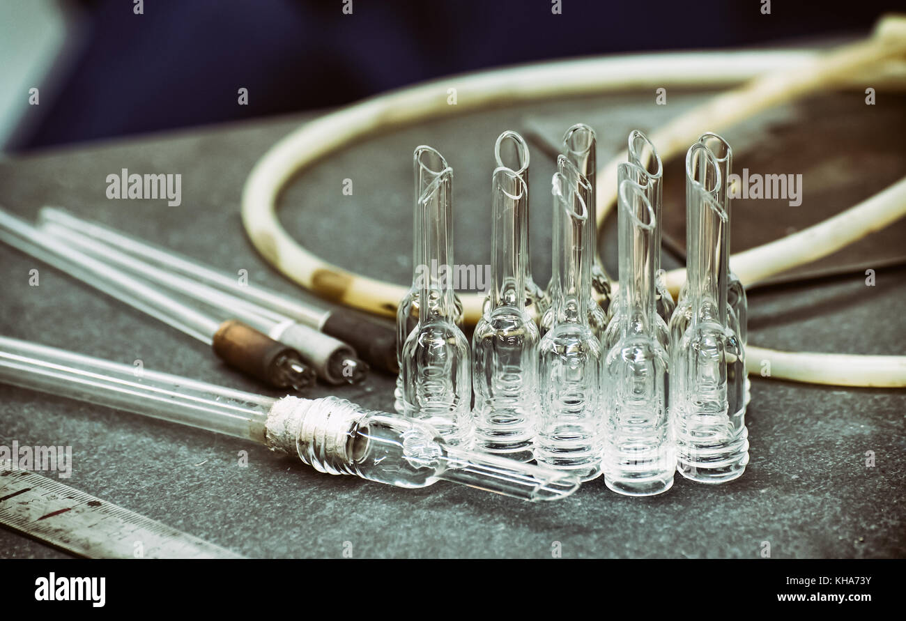Chemistry glassware in laboratory Stock Photo - Alamy
