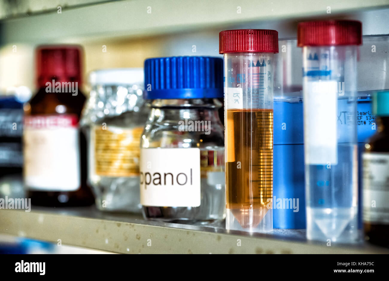 Plastic test tubes filled with chemicals, background Stock Photo - Alamy