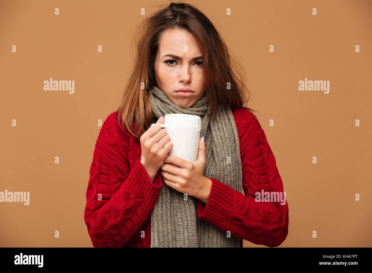 Sad girl in red scarf hi-res stock photography and images - Alamy