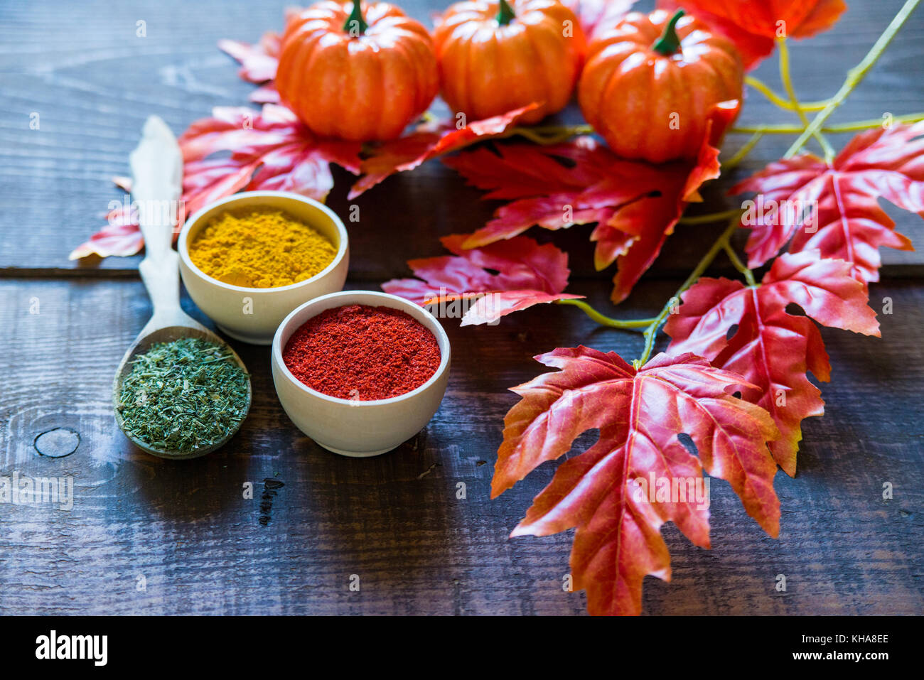 Fall background spices and leaves with pumpkins Stock Photo - Alamy