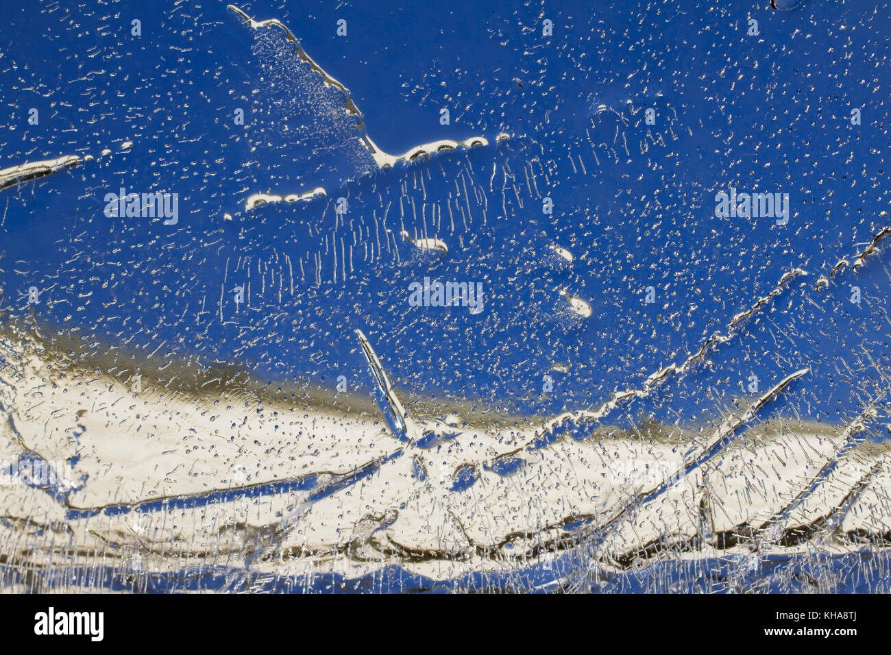 Close-up on a block of ice Stock Photo - Alamy