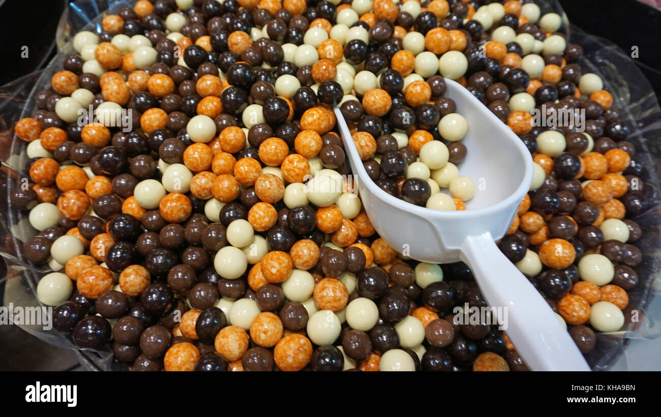 yummy and tasty sweets in many colours Stock Photo - Alamy