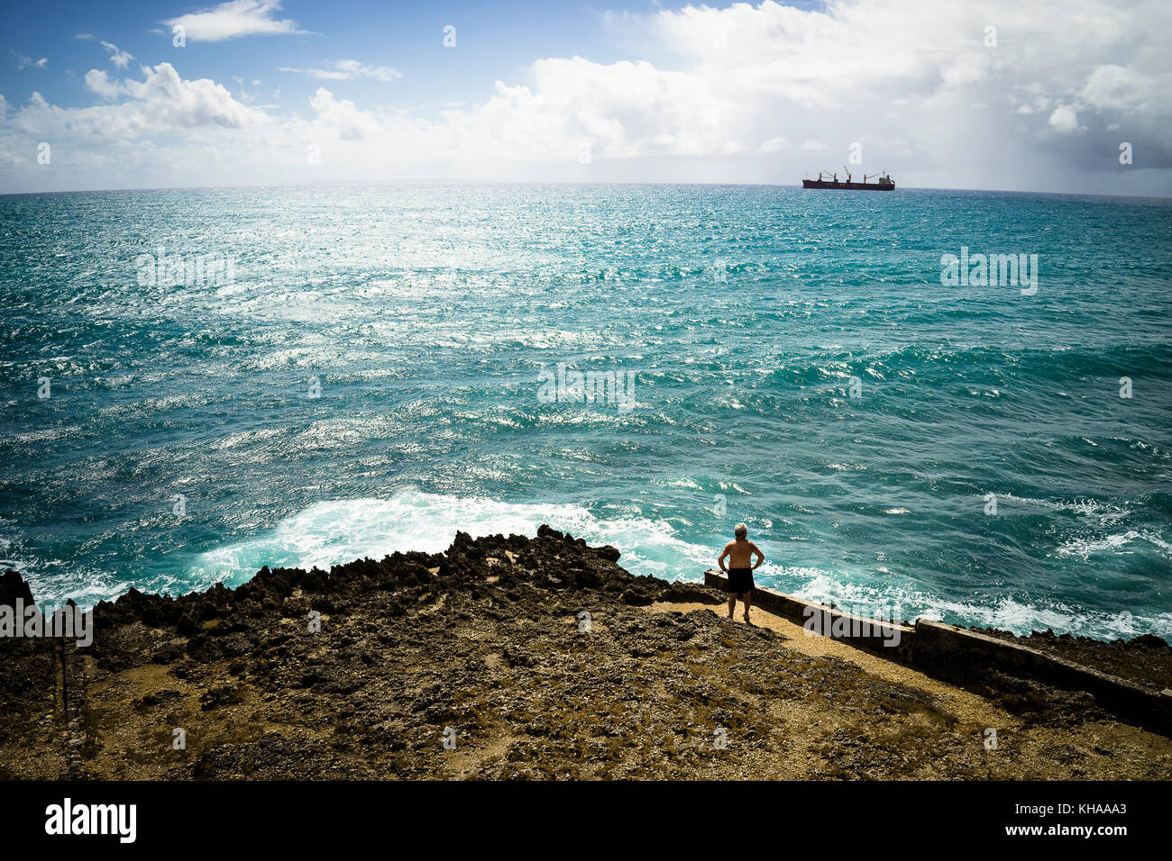 A man looking at a cargo, Gosier island, Guadeloupe, France Stock Photo ...