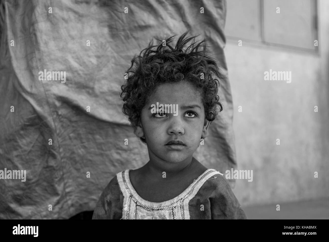 African child with a strong expression on her face. Taken in Mali Stock ...