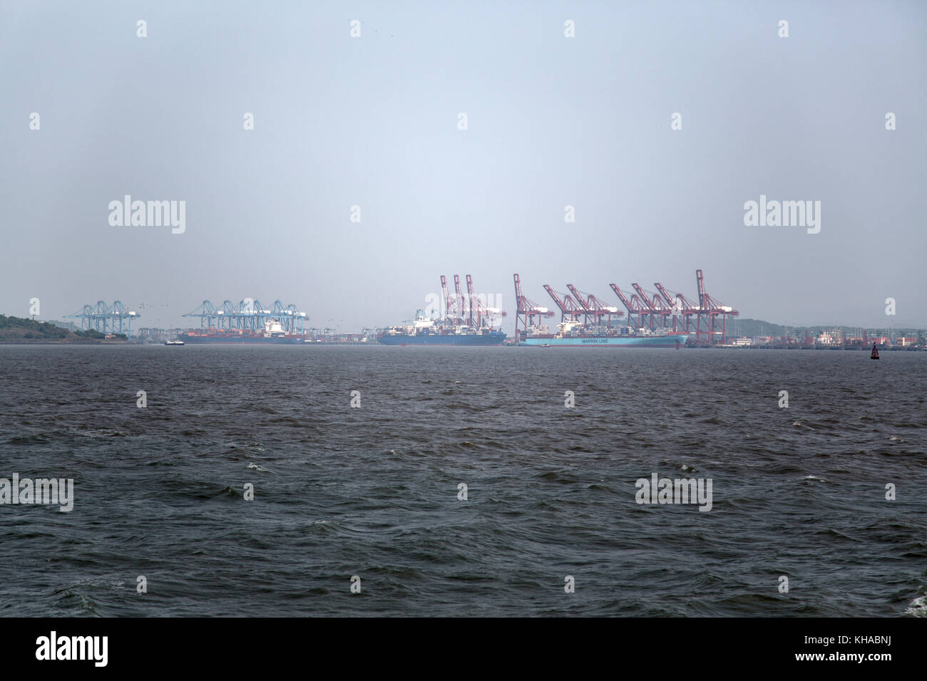 MUMBAI, INDIA - OCTOBER 11, 2015: Industrial ships in the waters of ...