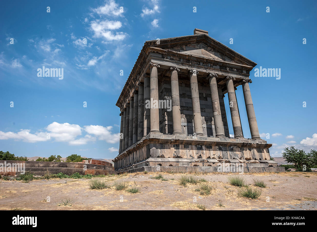Armenia. The pagan temple and the ruins of the fortress in the village ...