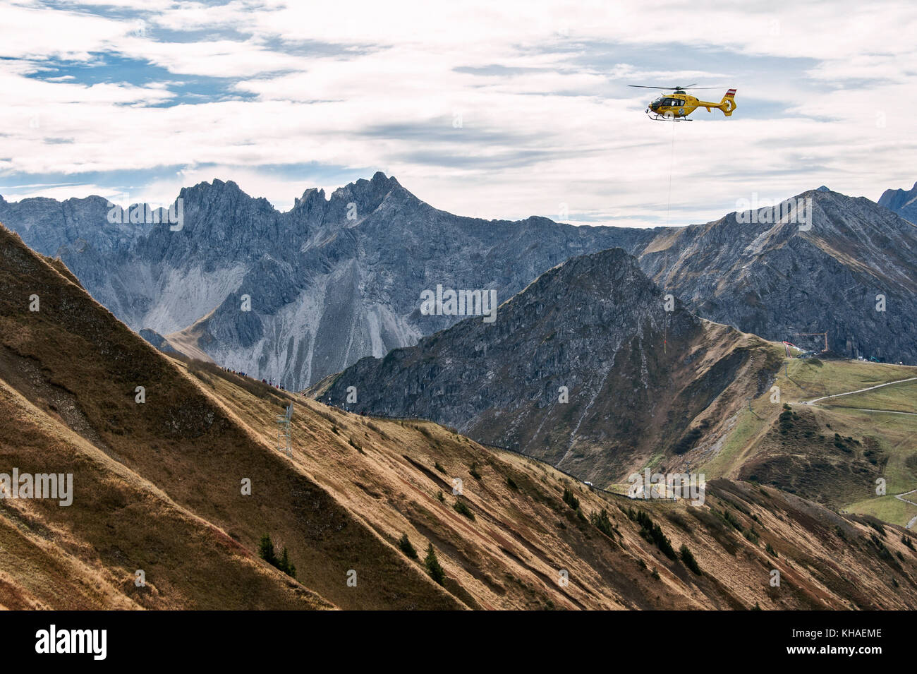 Mountain rescue by helicopter on the Fellhorn ridge, Kleinwalsertal ...