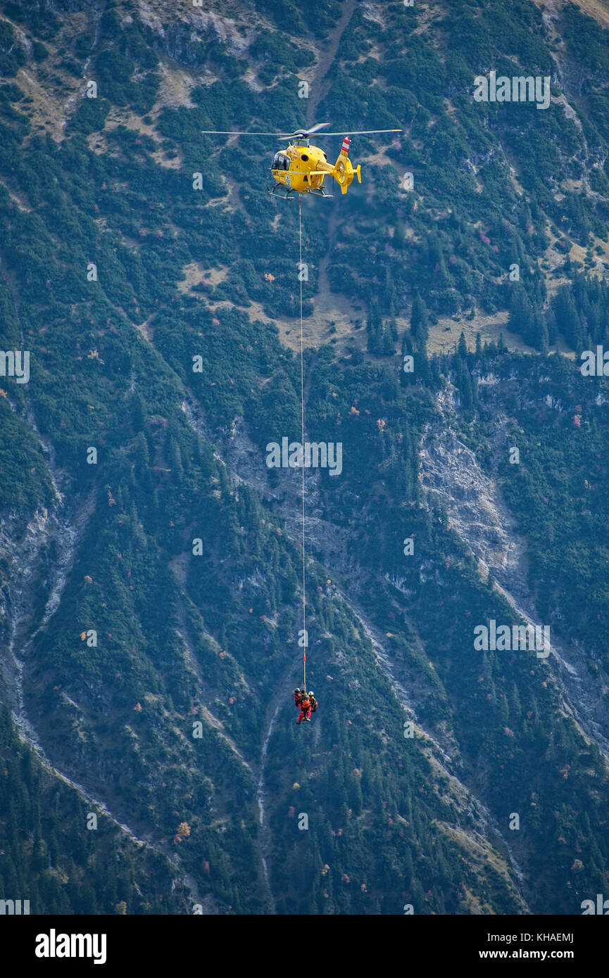 Mountain rescue by helicopter on the Fellhorn ridge, Kleinwalsertal ...