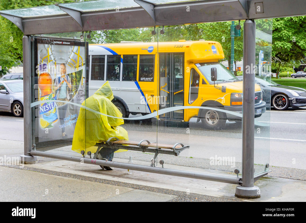 Waiting for the bus in the rain hi-res stock photography and images - Alamy