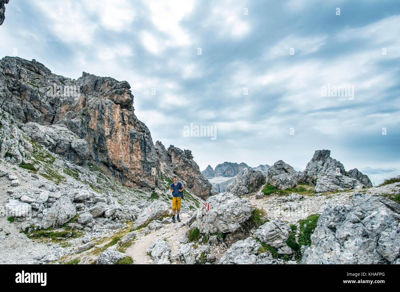 Hikers on the circular trail around the Sella Group, Gardena Pass ...