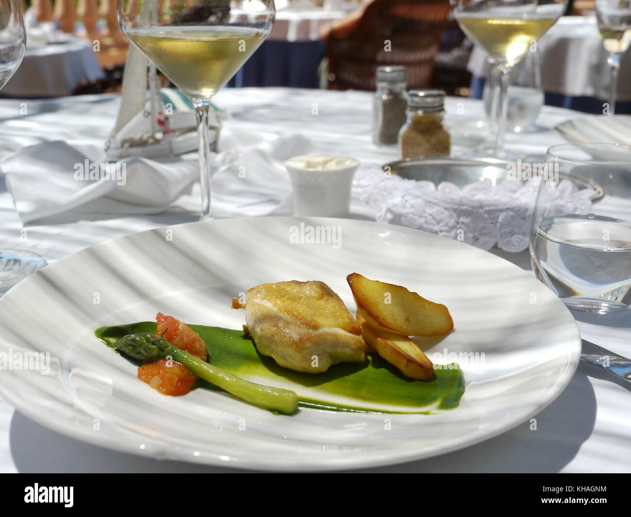 Closeup of a dinner with chicken in the restaurant Es Raco D'es Teix in ...