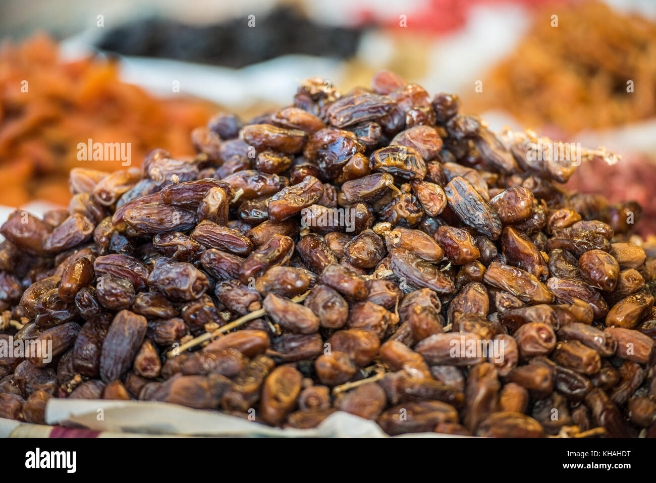 Detail of a basket of dates in a stall of the medieval market of the ...