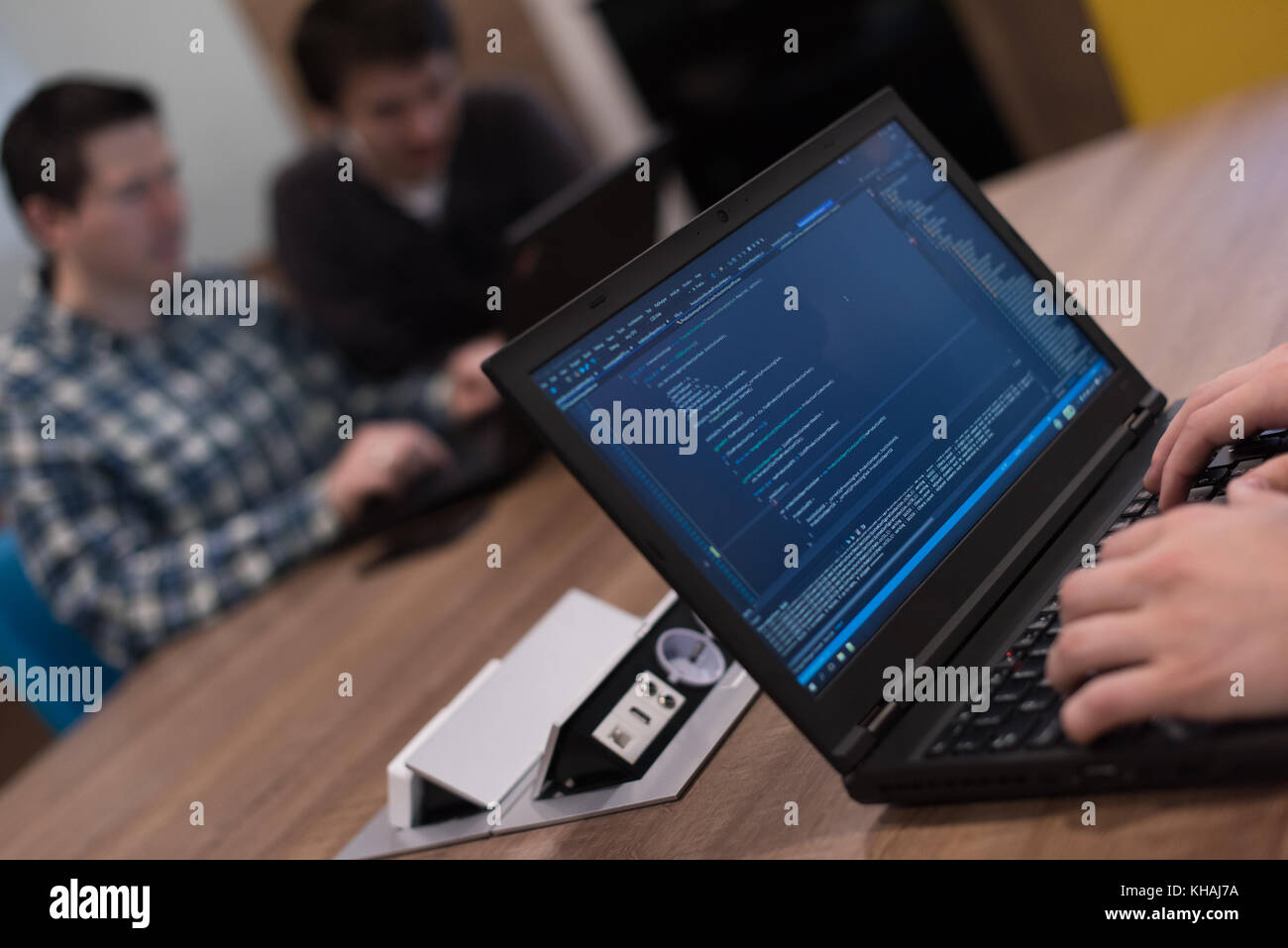 software developer writing programming code on laptop computer Stock ...