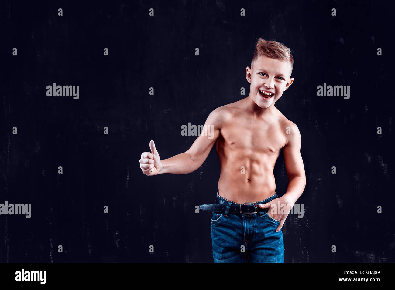 Happy bare-chested boy Stock Photo - Alamy