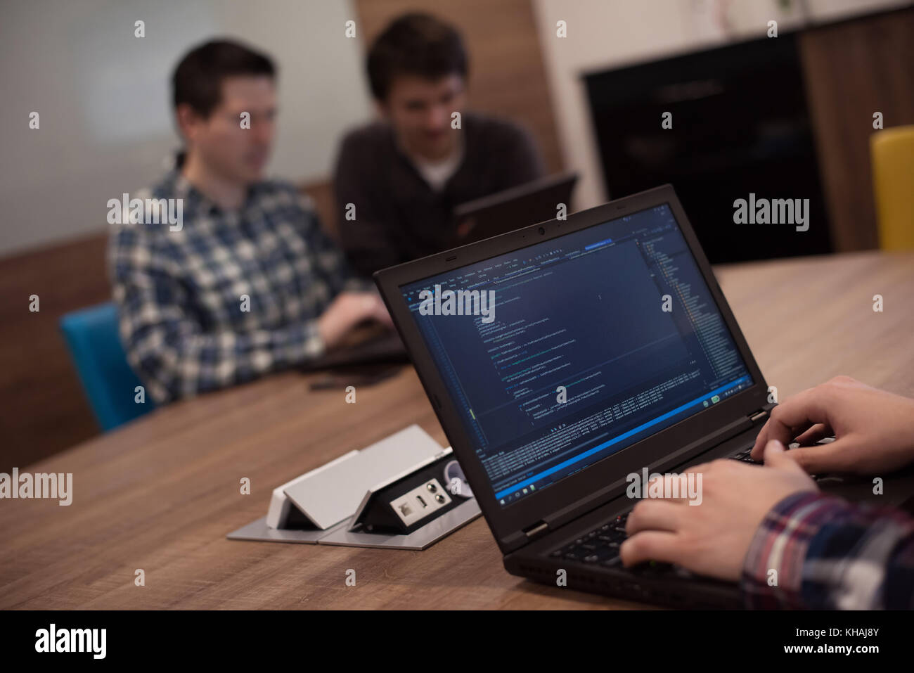 software developer writing programming code on laptop computer Stock ...