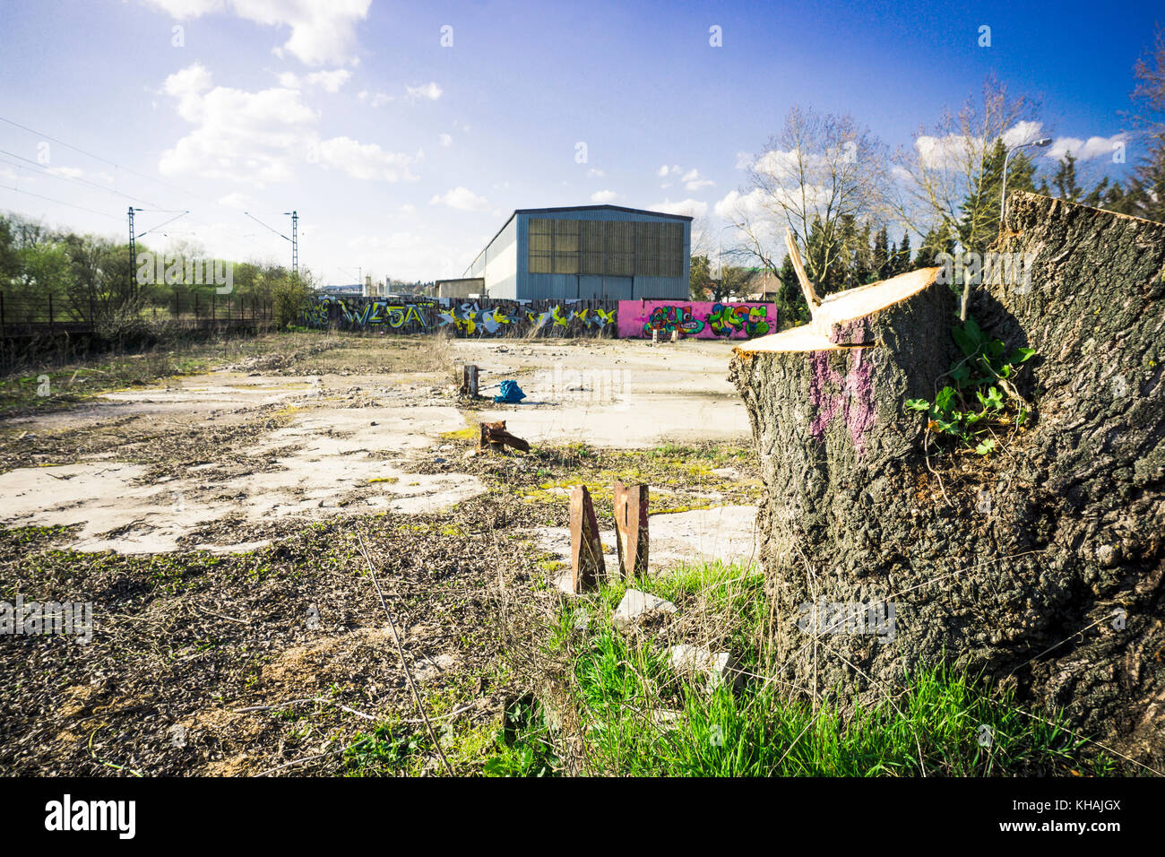 Foundation after building demolition with graffiti in the background ...