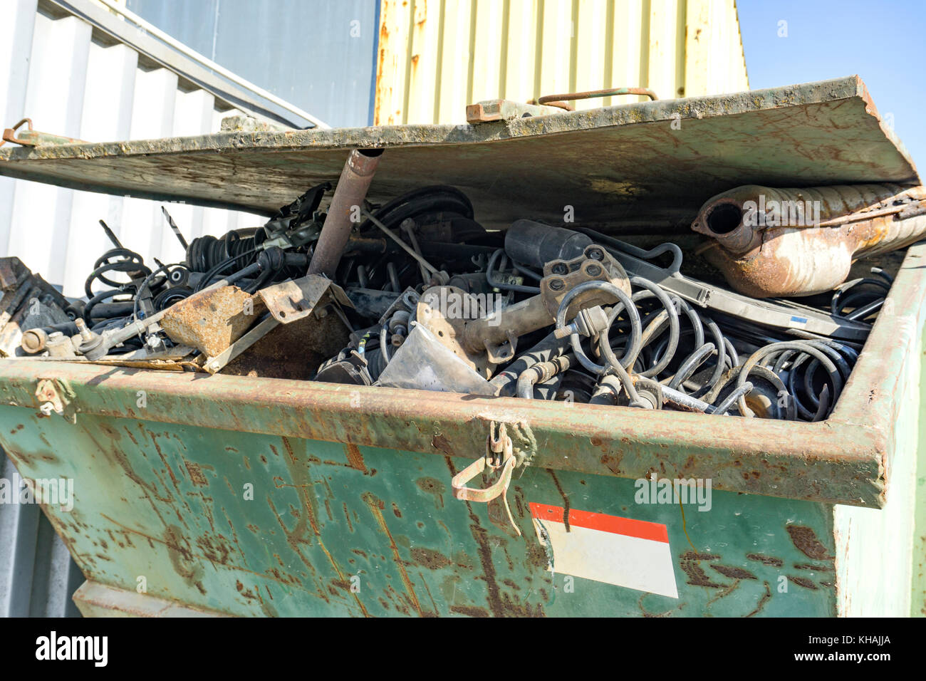 Collected scrap metal in rusty container Stock Photo - Alamy