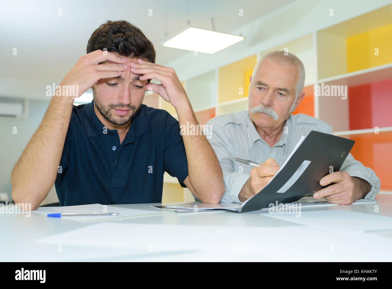 attractive two business partners are working in cooperation Stock Photo ...