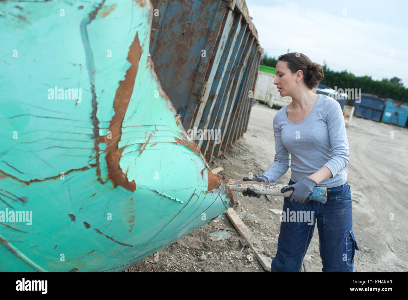 female junk yard worker Stock Photo - Alamy