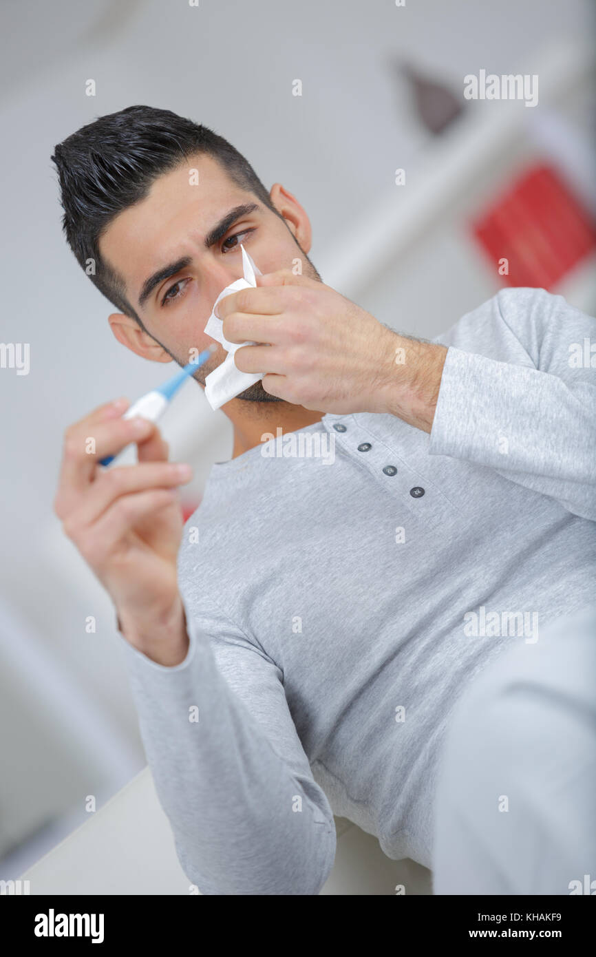 portrait of a sick man with the flu allergy germs Stock Photo - Alamy