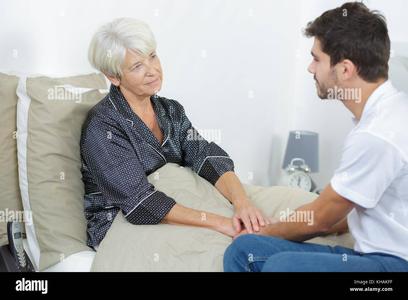 old woman at hospital ward with assistant Stock Photo - Alamy