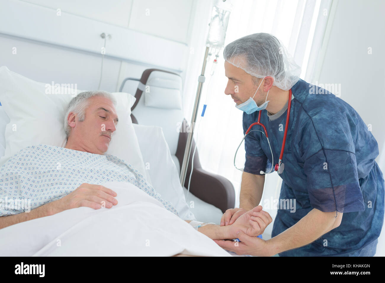 doctor with senior patient Stock Photo - Alamy