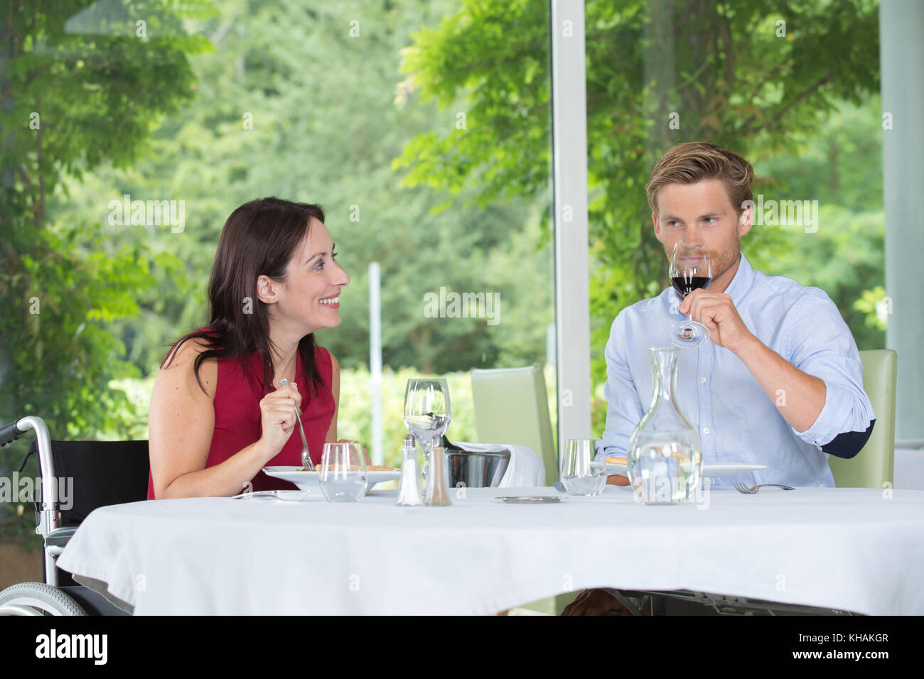 Couple in restaurant, man sampling wine Stock Photo - Alamy