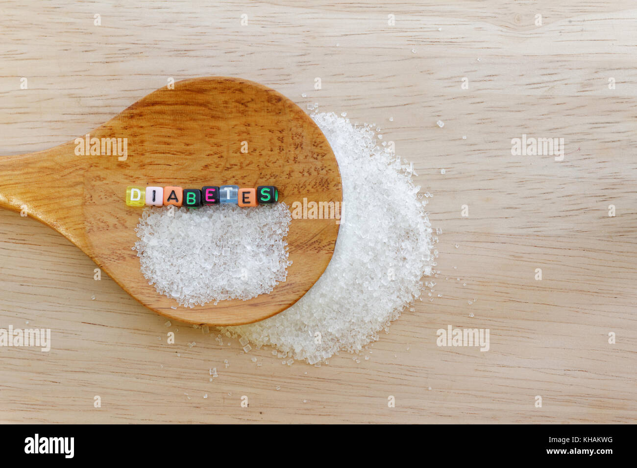 Diabetes concept. Alphabet with word DIABETES with sugar and wooden ...