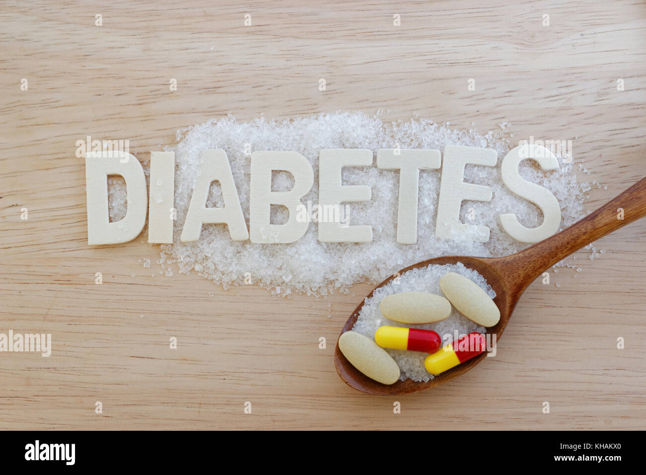 Diabetes concept. Alphabet with word DIABETES with sugar and wooden ...