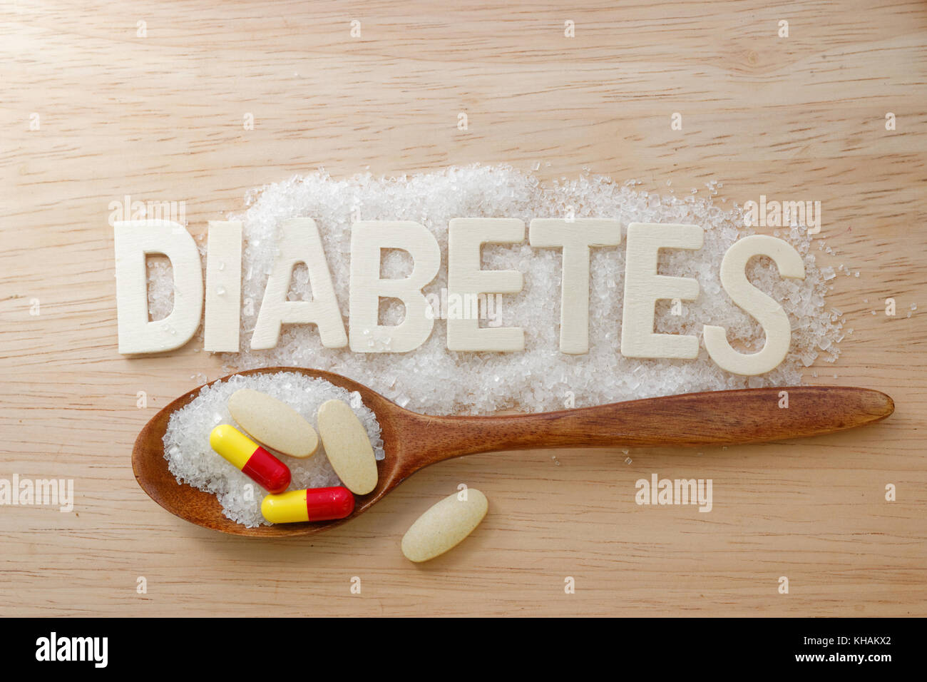 Diabetes concept. Alphabet with word DIABETES with sugar and wooden ...