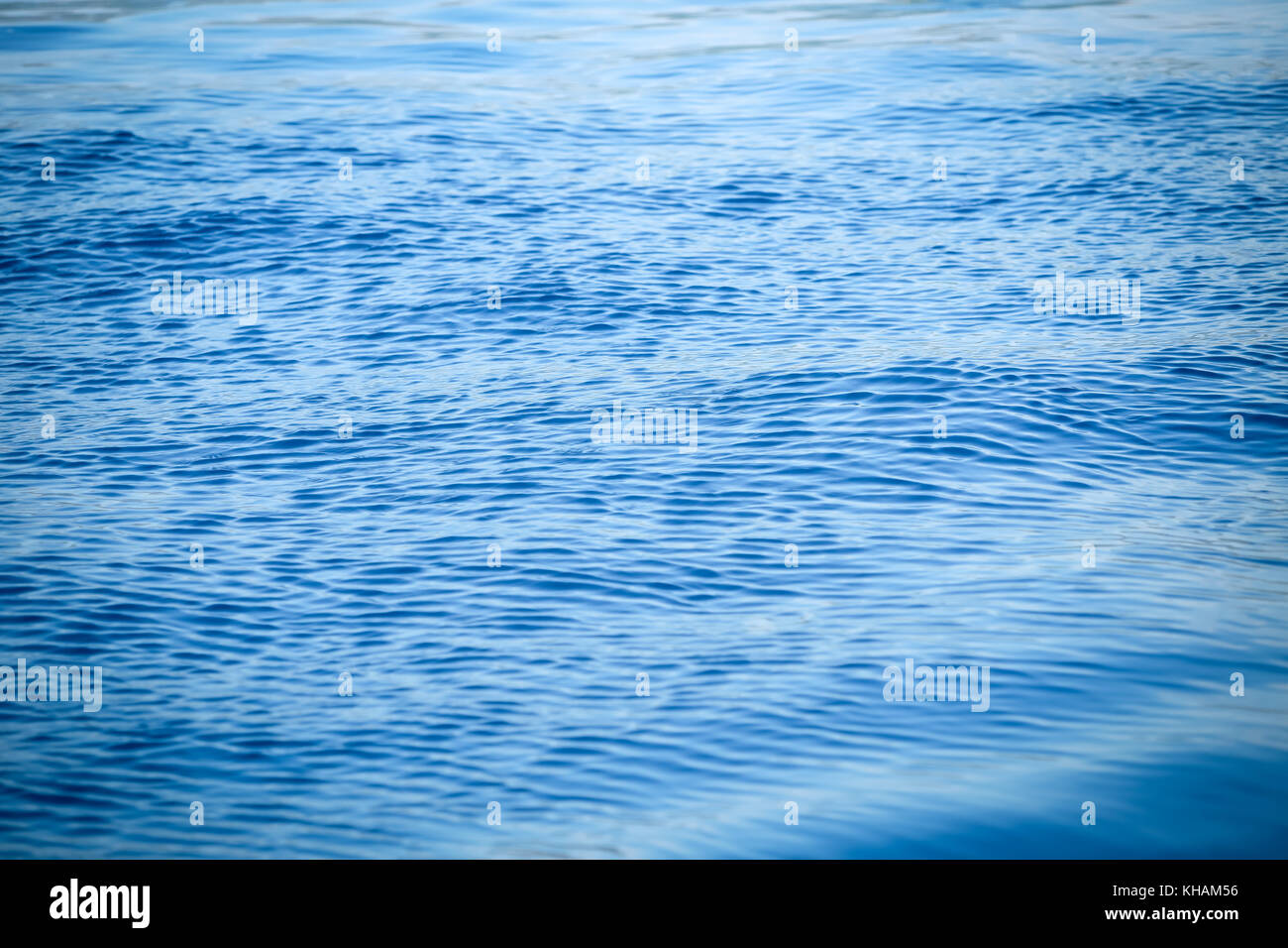 Blue sea surface background Stock Photo - Alamy