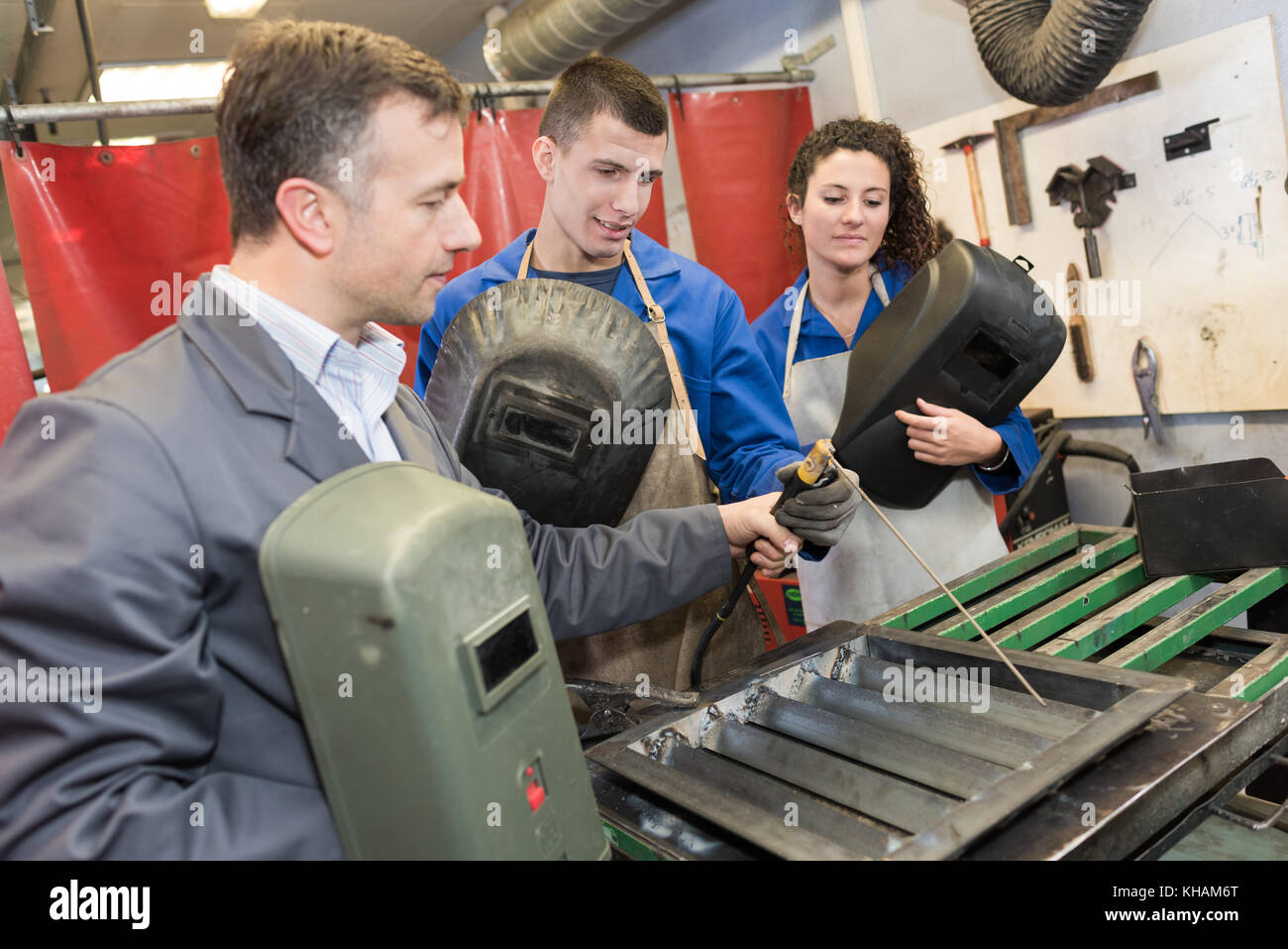 metalwork apprentice in metallurgy training class Stock Photo - Alamy