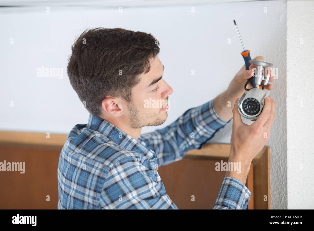 professional cctv technician working Stock Photo - Alamy