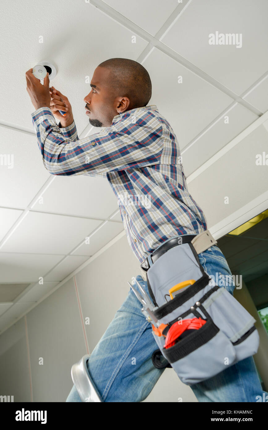 man installing bulb Stock Photo - Alamy