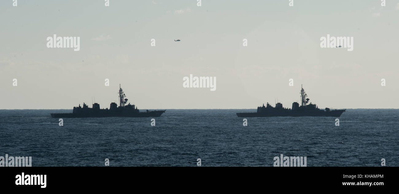The Arleigh Burke-class guided-missile destroyers USS Dewey (DDG 105 ...
