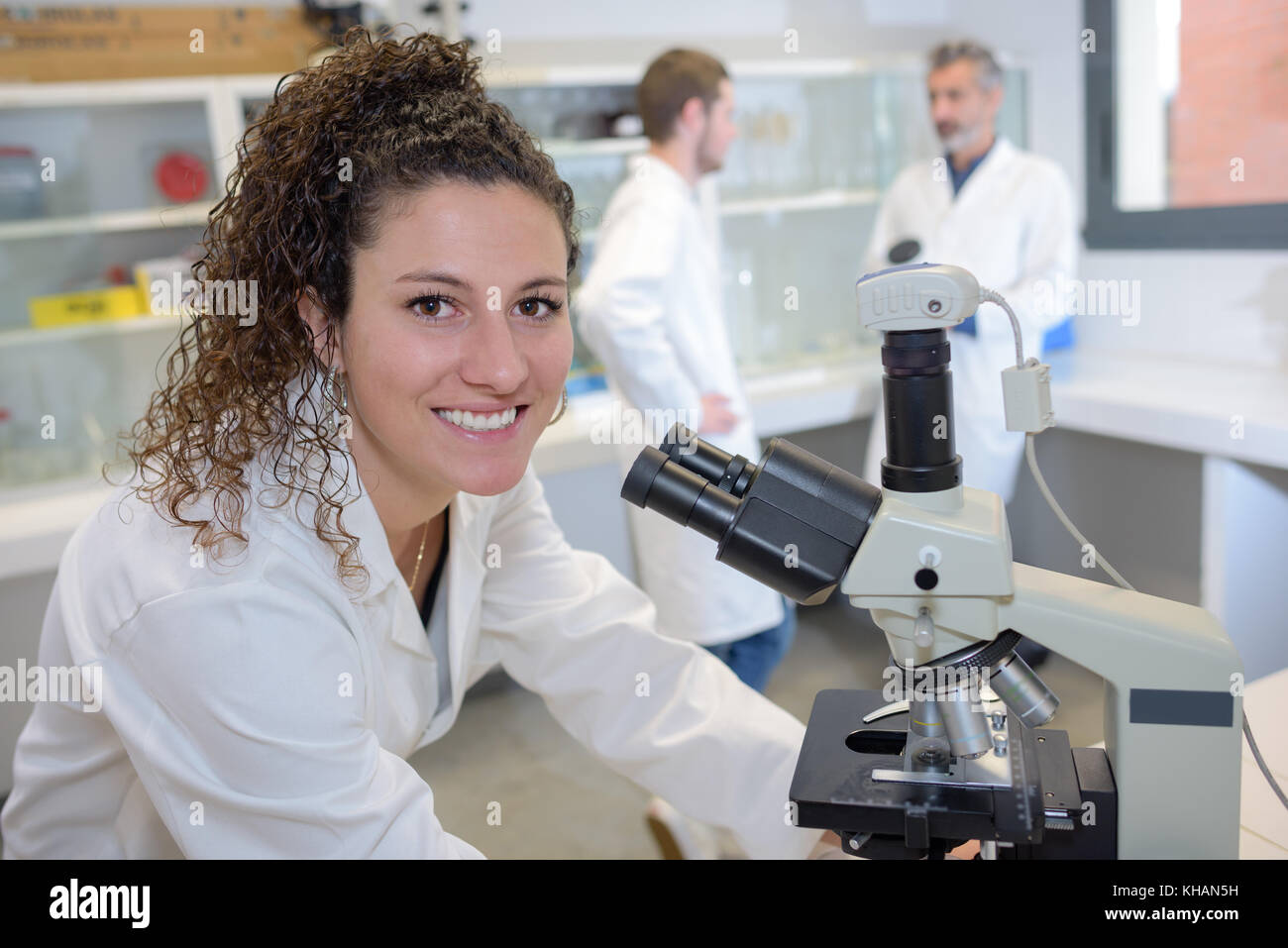 young researcher working with microscope in the lab Stock Photo - Alamy