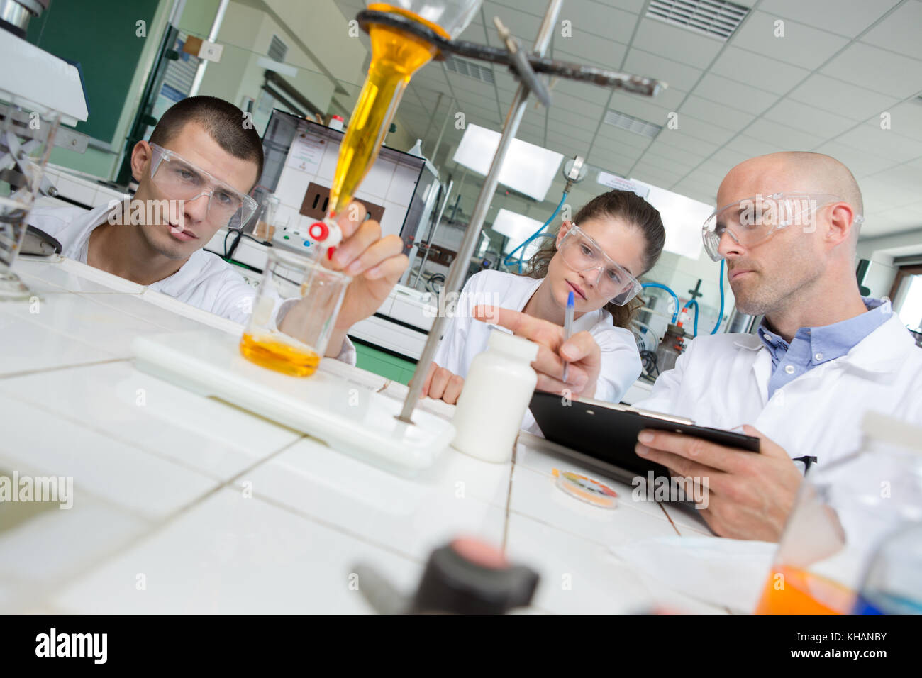 science students working with chemicals in lab at the university Stock ...