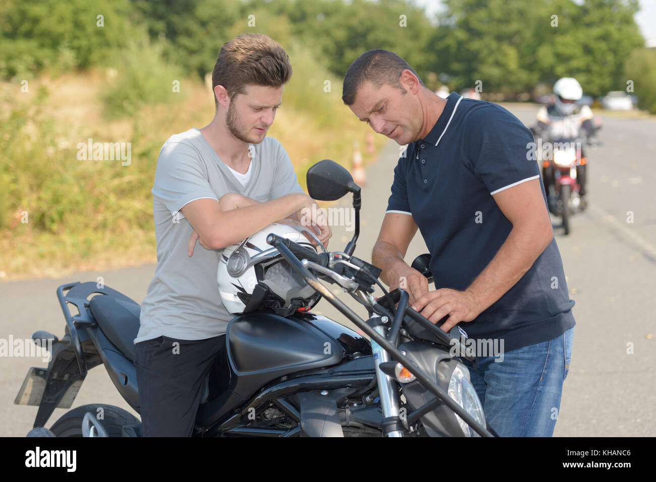 man motorcyclist and driving instructor Stock Photo - Alamy