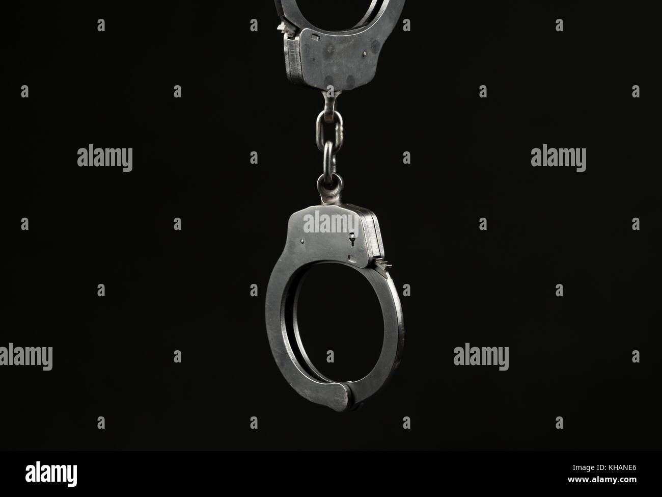 Locked handcuffs hi-res stock photography and images - Alamy