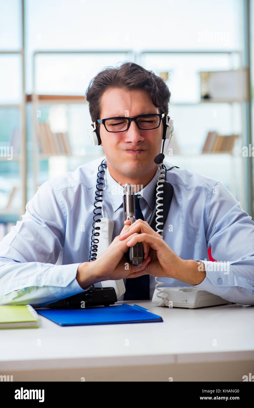 Unhappy angry call center worker frustrated with workload Stock Photo ...