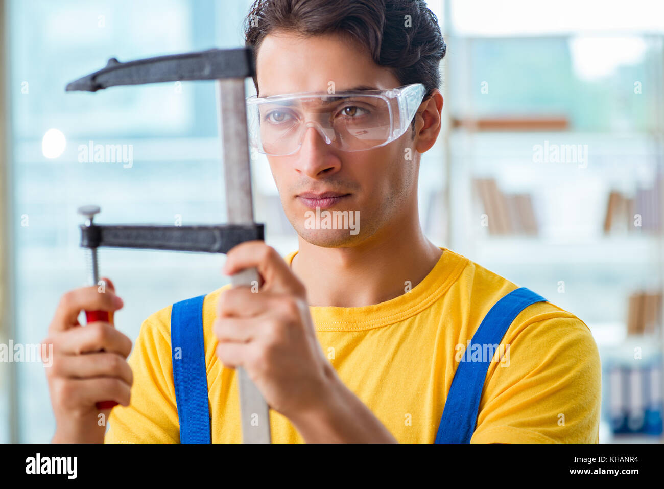 Furniture carpenter working in the workshop Stock Photo - Alamy