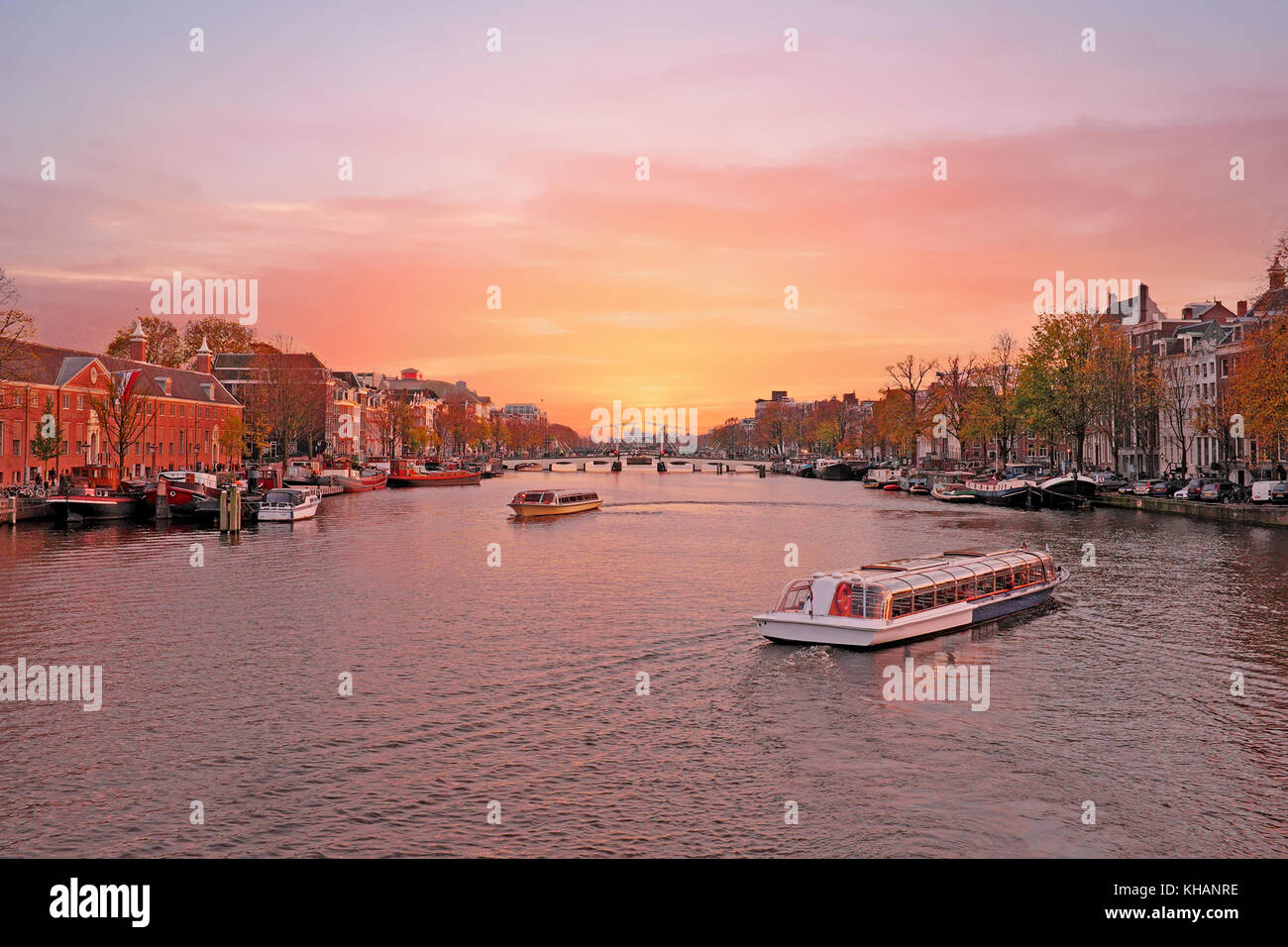 City scenic from Amsterdam in the Netherlands at the river Amstel at ...
