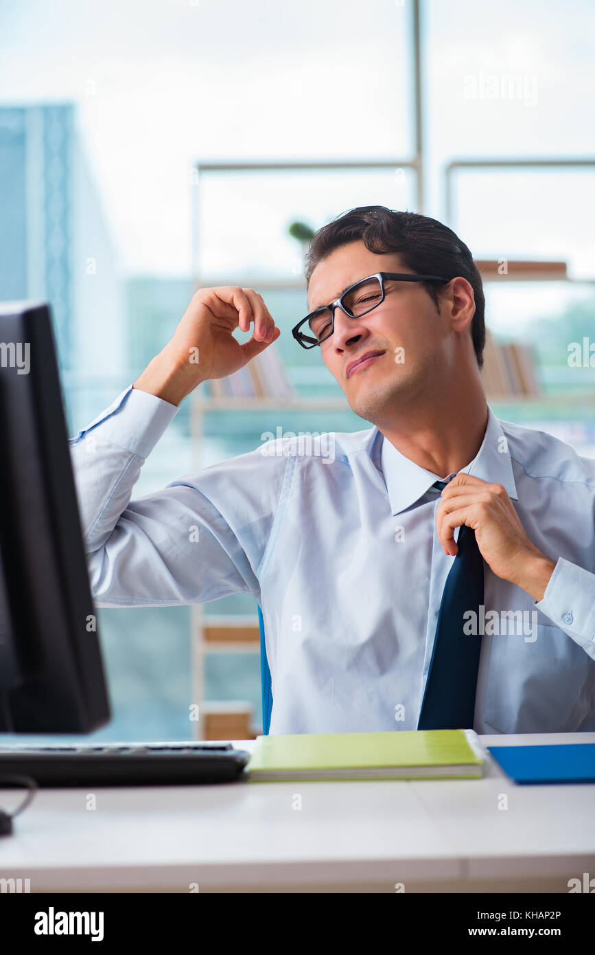 Businessman suffering from excessive armpit sweating Stock Photo - Alamy