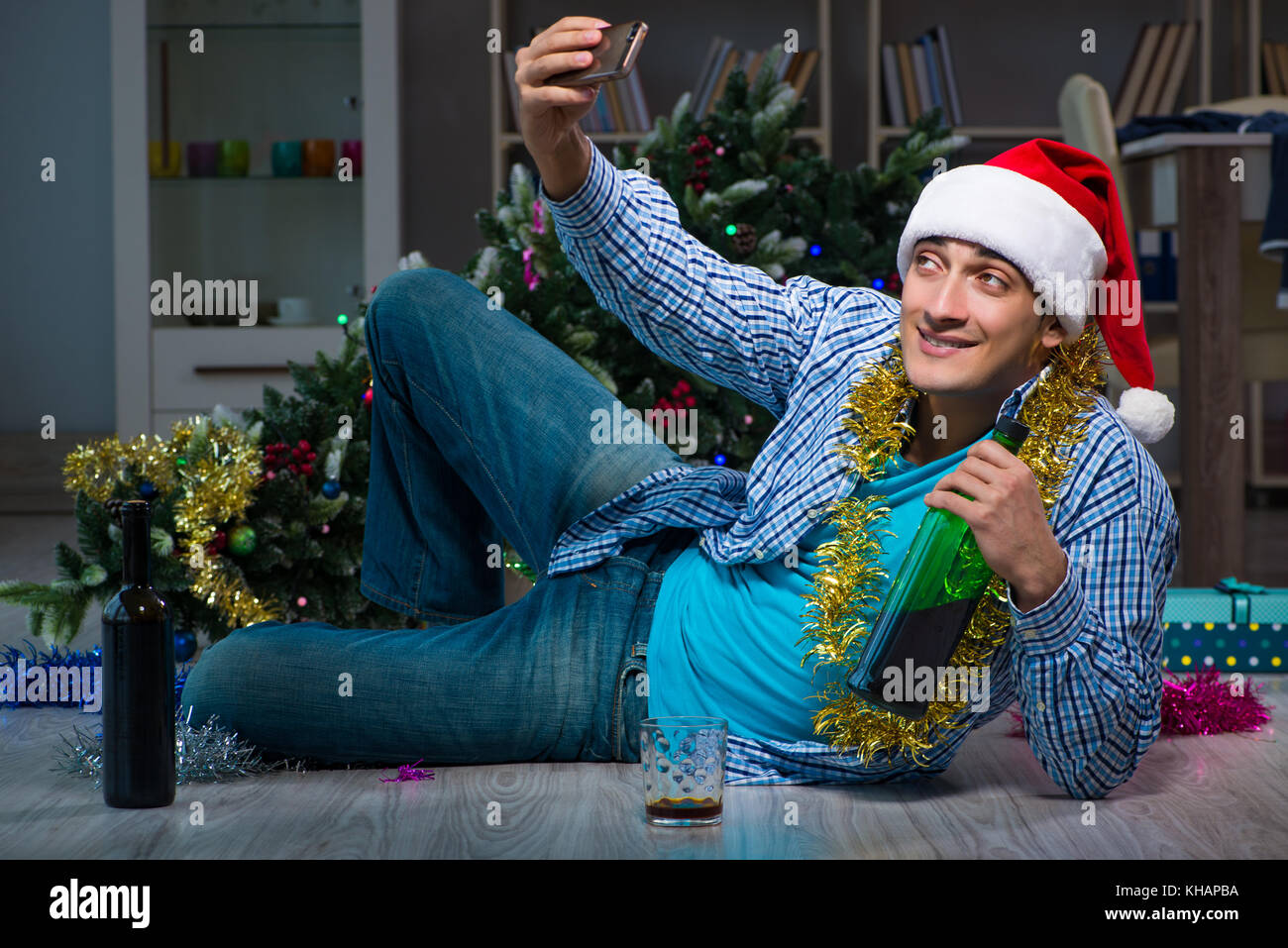 Man celebrating christmas at home alone Stock Photo - Alamy
