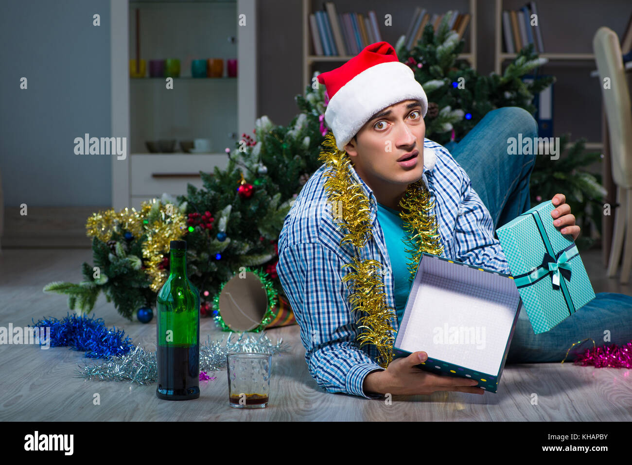 Man celebrating christmas at home alone Stock Photo - Alamy