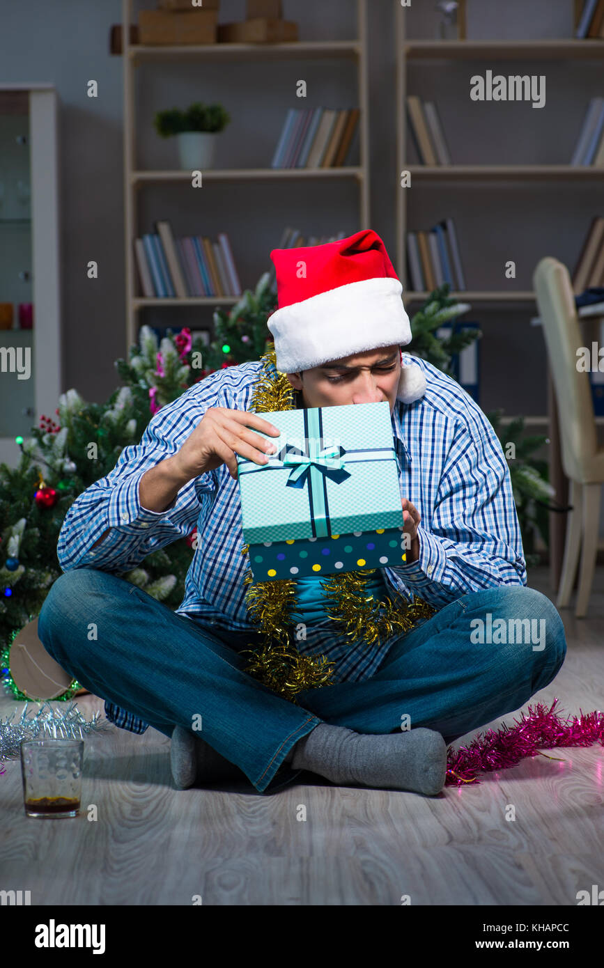 Man celebrating christmas at home alone Stock Photo - Alamy