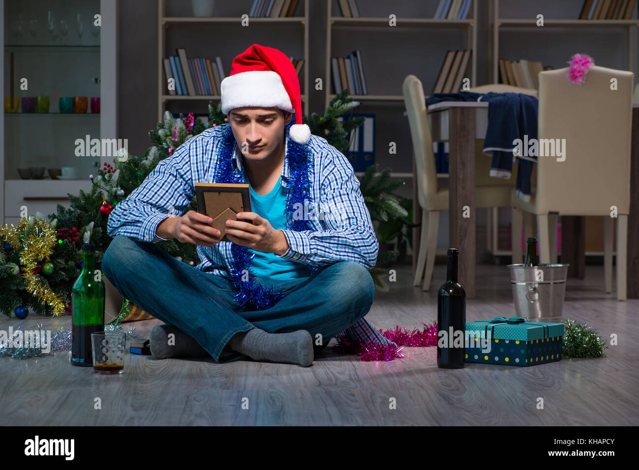 Man celebrating christmas at home alone Stock Photo - Alamy