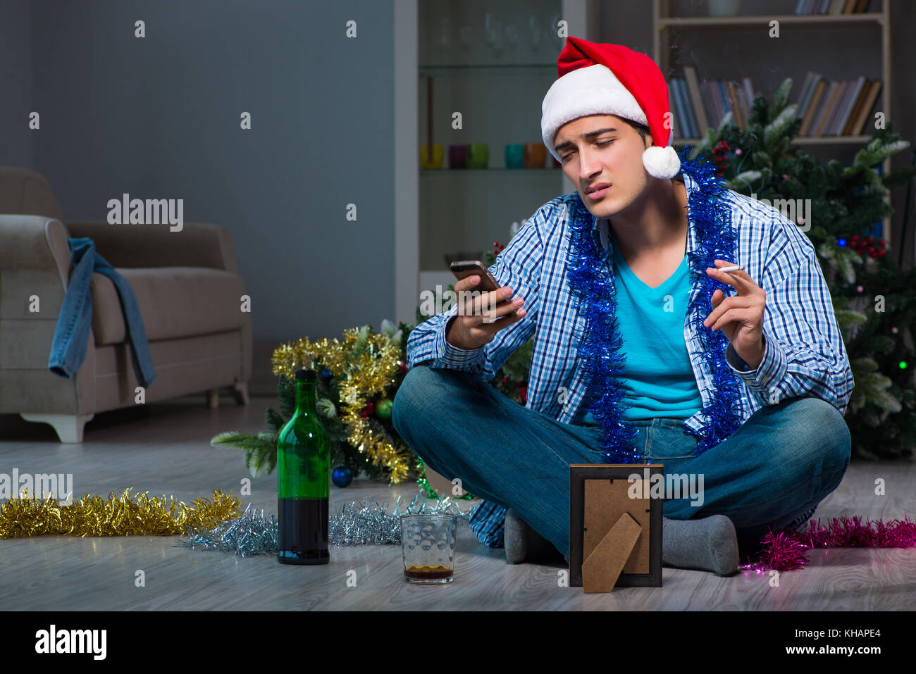 Man celebrating christmas at home alone Stock Photo - Alamy
